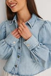 Oberteil mit Puffärmeln aus Denim Blau | NA-KD
