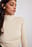 Gerippter Pullover mit Schulterpolster Offwhite | NA-KD
